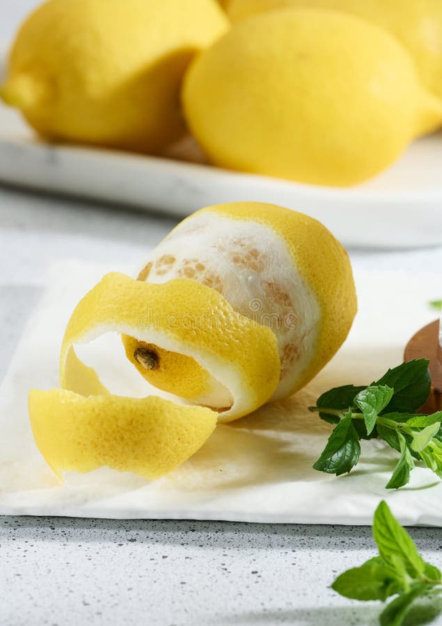 Peeled Lemon on White Table Stock Photo - Image of juicy, vitamin: 341441272