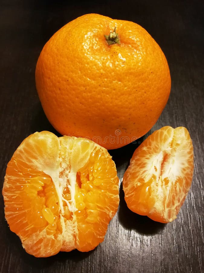 Peeled Mandarin Orange on Black Stock Image - Image of black ...