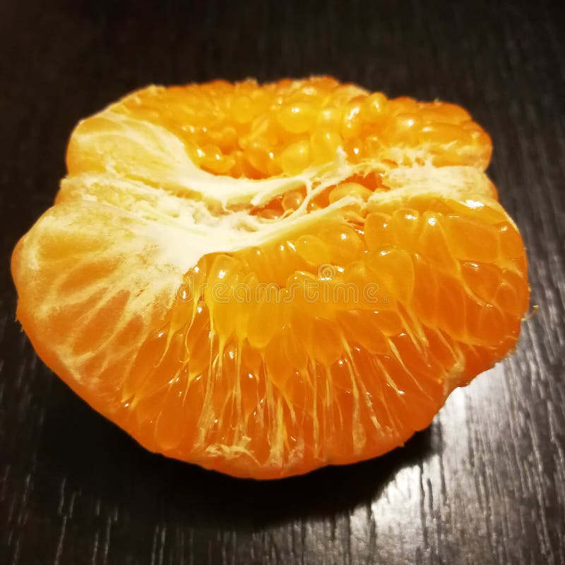 Peeled Mandarin Orange on Black Stock Photo - Image of health, mandarin ...