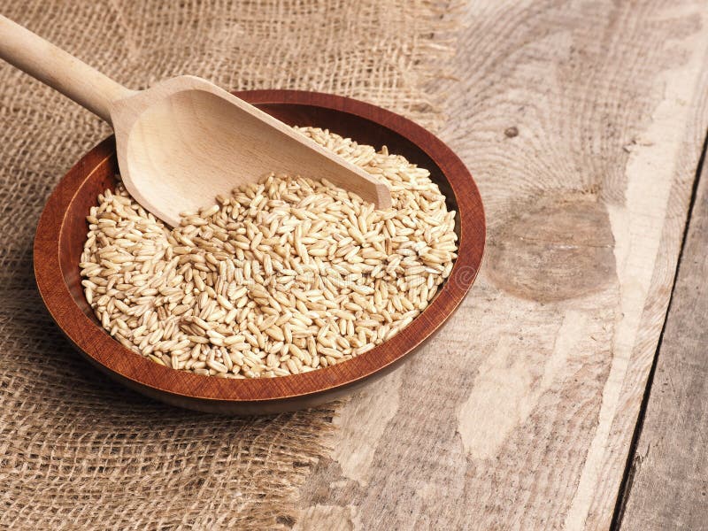 Peeled Oats in a Wooden Bowl Stock Photo - Image of groat, rolled ...