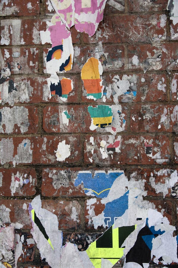 Peeled Posters on a Wall Background Texture Stock Image - Image of ...