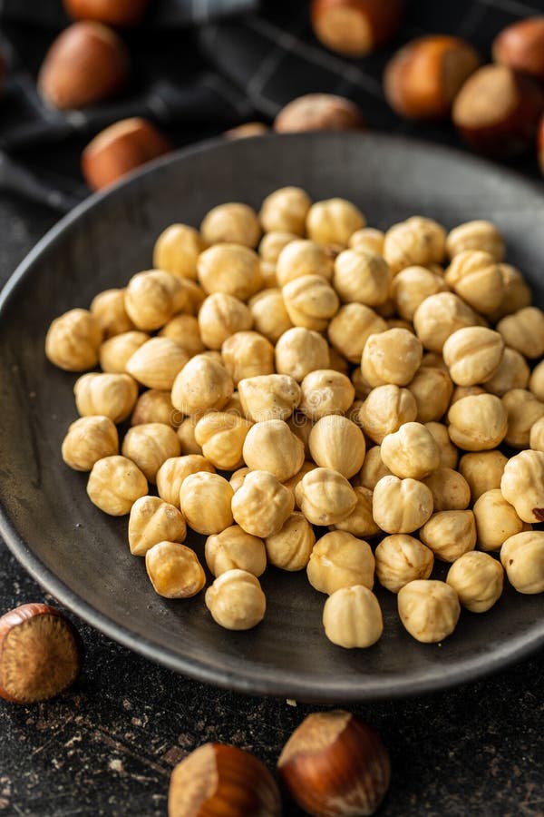 Peeled Roasted Hazelnut Kernels Stock Photo - Image of peeled, black ...