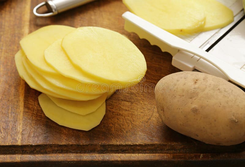 Peeled and Sliced Raw Potatoes Stock Image - Image of uncooked, closeup ...