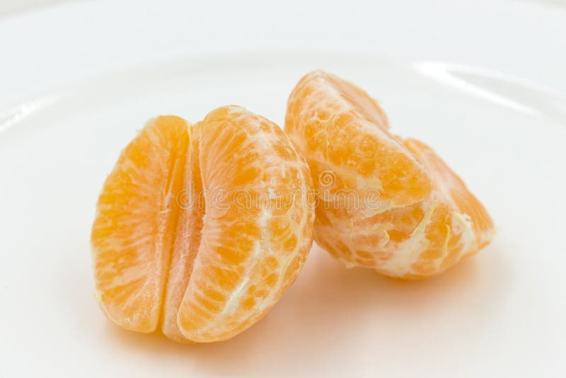 Peeled from the Upper Skin Tangerines on White Plate. Stock Photo ...