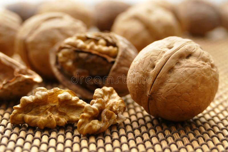 Peeled Walnut Closeup. Group of Walnuts a Bamboo Napkin Stock Photo ...