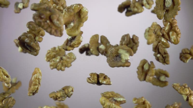 Peeled Walnut Nuts are Bouncing on a White Background Stock Footage ...