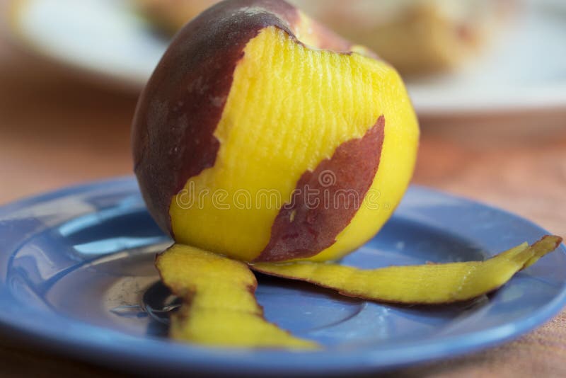 Peeling a fresh peach stock image. Image of summer, rind - 95393163