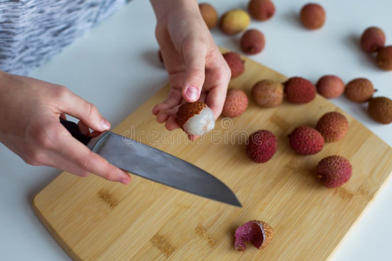 Peeling Lychee with Knife in Hands Stock Photo - Image of bowl, group ...