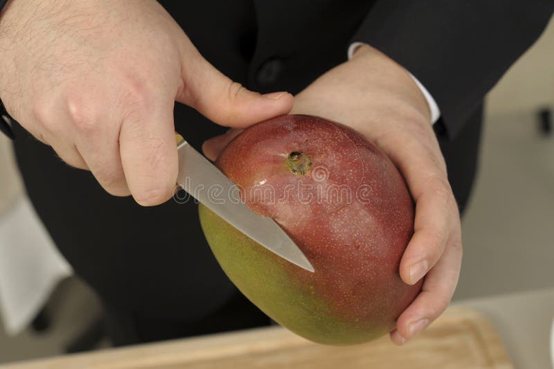 Peeling a mango stock image. Image of ingredient, fruit - 23708917