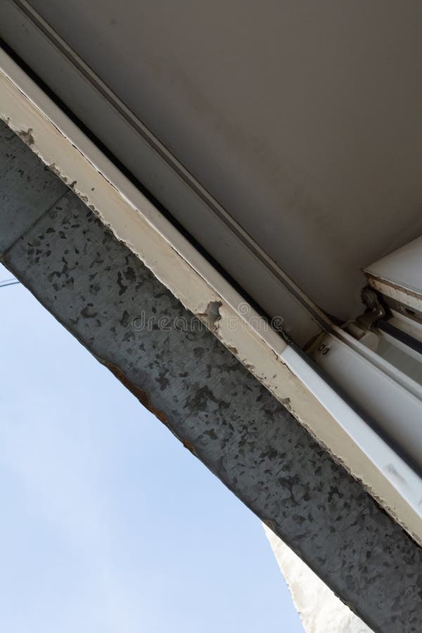 Peeling Plaster of the Facade Around the Window Opening. Insulation of ...