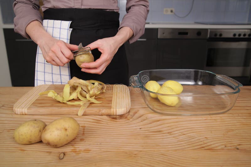 Peeling Potato stock photo. Image of food, cuttingboard - 28449818