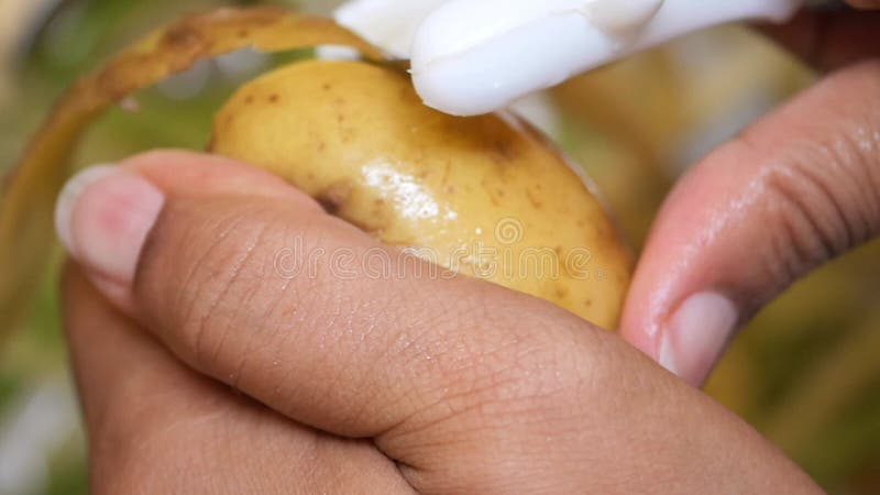 Peeling a Potato in a Rustic Kitchen Stock Footage - Video of manual ...