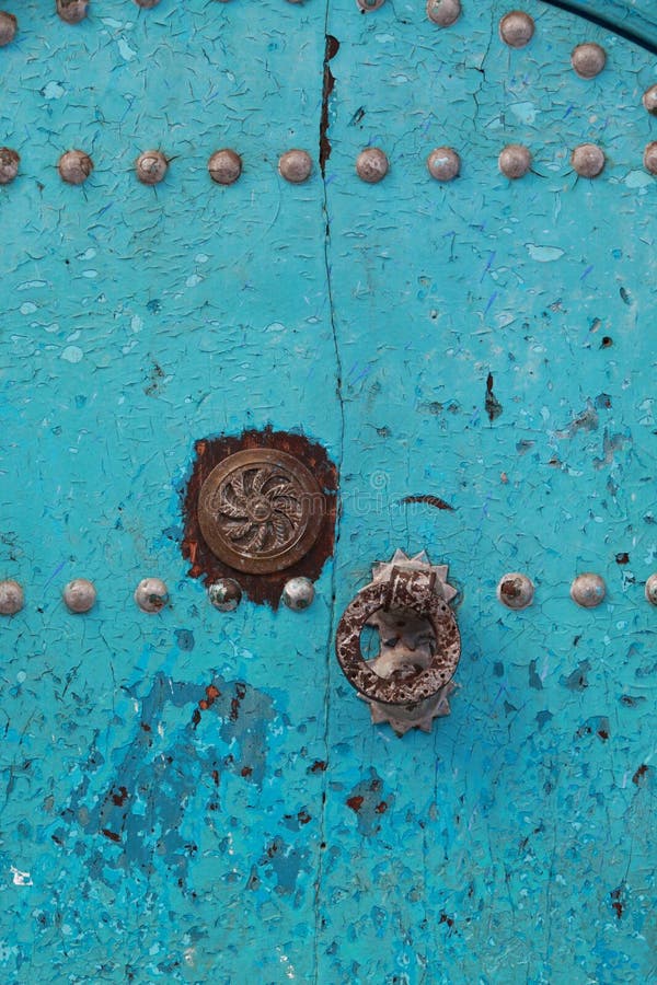 Peephole and Knocker on an Old Cracked Door Stock Image - Image of blue ...