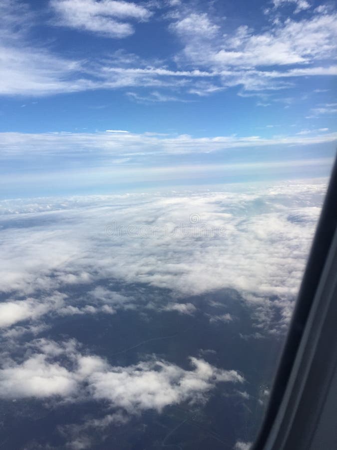 Peeping through the Clouds stock photo. Image of looking - 63025832