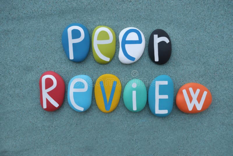 Peer Review Phrase Composed with Multi Colored Stone Letters Over Green ...