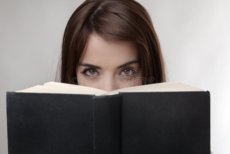 Peering over book stock image. Image of dreaming, lifestyle - 33995537