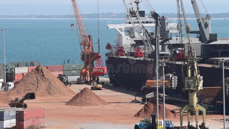Pegasus Boat in the Process of Unloading Wood Chips Carrier To the Port ...