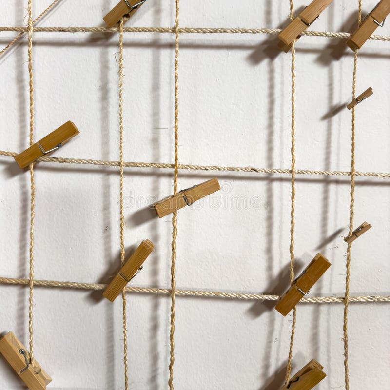 Pegs Clipped To String stock photo. Image of attached - 287926672
