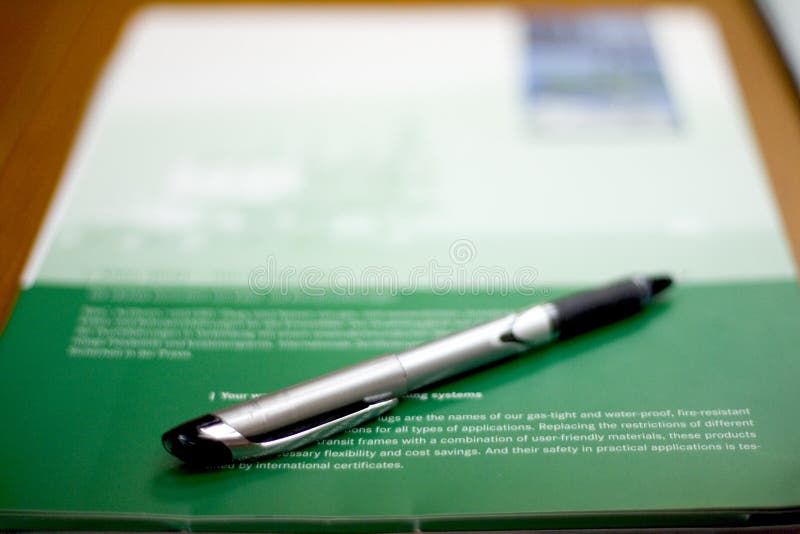 Pen and brochure stock photo. Image of desk, documents - 118180