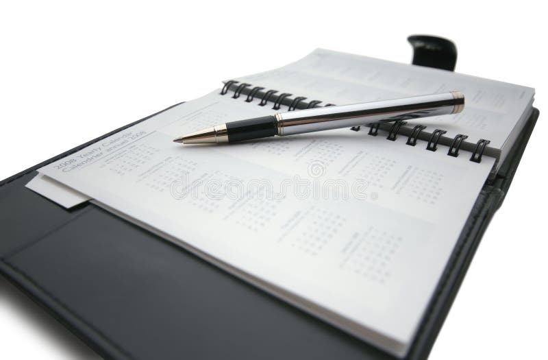Day planner & pen - 2 stock image. Image of organizer - 2081927