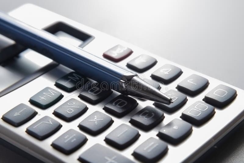 Pen and Calculator on Business Paper. Stock Photo - Image of finance ...