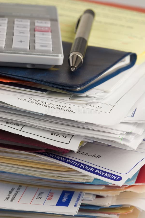 Pen, Calculator and Check Book on a Stack of Bills Stock Image - Image ...