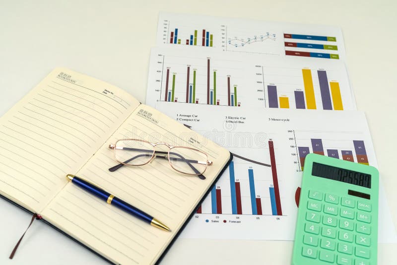 Pen and Calculator on Financial Paper Chart on Desk Stock Image - Image ...