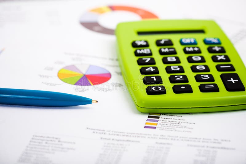 Pen and Calculator on a Paper with Graph and Charts. Stock Image ...