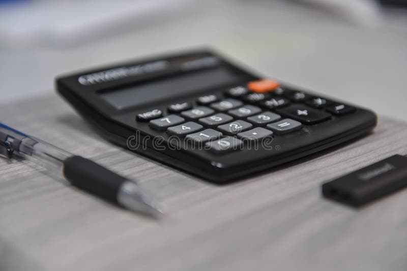 Calculator, Pen and Usb Stick in the Office Stock Image - Image of ...