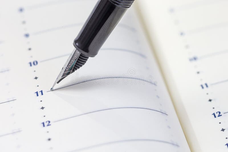 Pen on Calendar Page. Ready To Writte Something on the Planner Stock ...