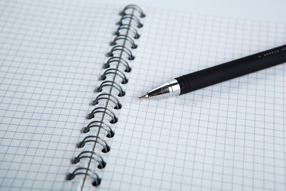 Pen on the Checkered Paper Notebook Stock Image - Image of checkered ...