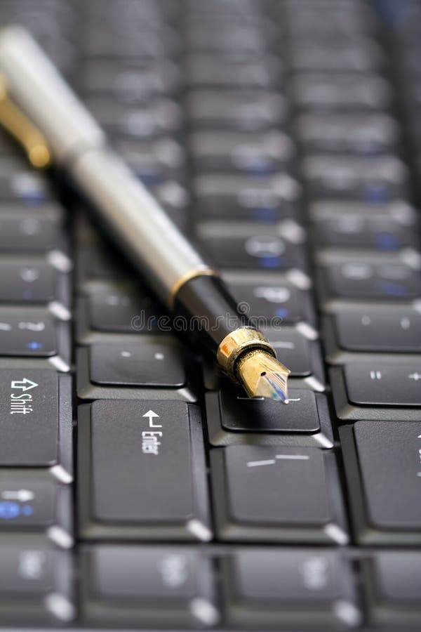 Pen on computer keyboard stock photo. Image of business - 8209968