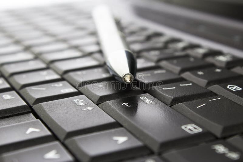 Pen on computer keyboard stock image. Image of data, digits - 34792123