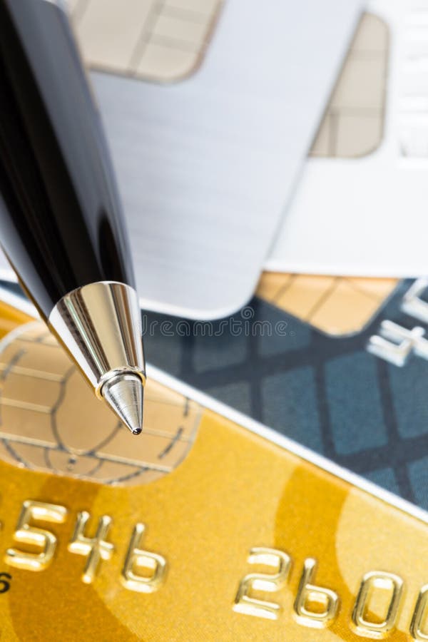 Pen on credit cards stock image. Image of credit, macro - 47114231