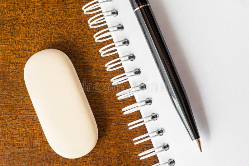 Pen and Eraser with the Notebook Stock Photo - Image of chrome ...