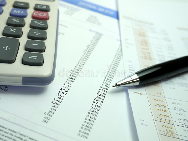 Pen on Financial Documents with Calculator Stock Photo - Image of paper ...