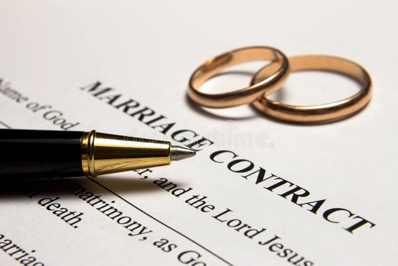 Pen and Gold Rings on the Contract Stock Photo - Image of document ...