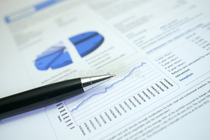 Pen and Graph on Financial Figures Stock Photo - Image of investment ...