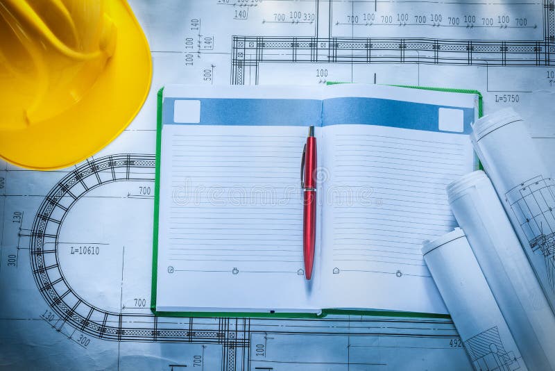 Pen Hard Hat Construction Drawings Notepad on Blueprint Stock Image ...