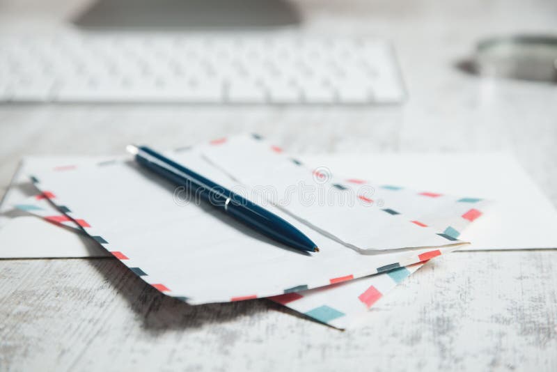 Pen on Letters with Computer Keyboard on Desk. Stock Photo - Image of ...