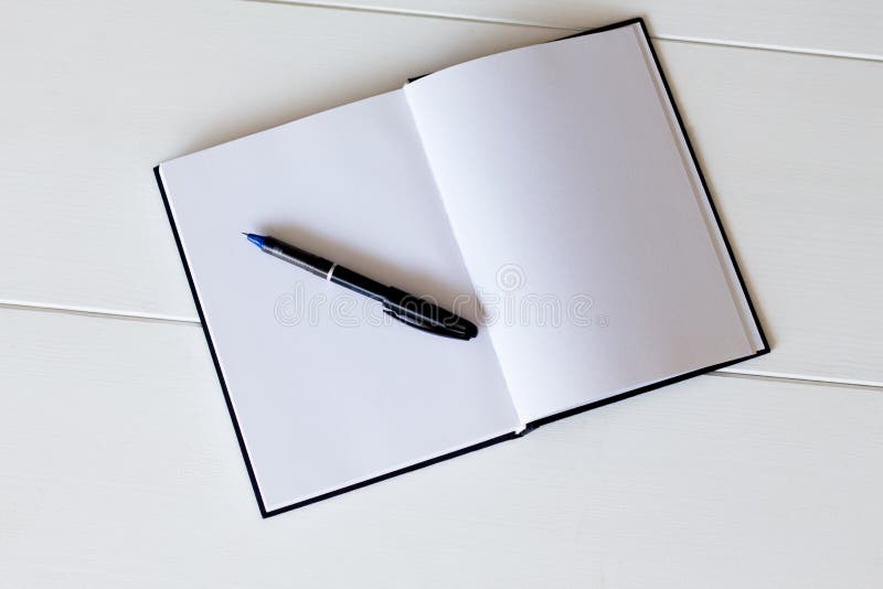 Pen Lying on Opened Clear Notepad. Horizontal Indoors Shot Stock Photo ...