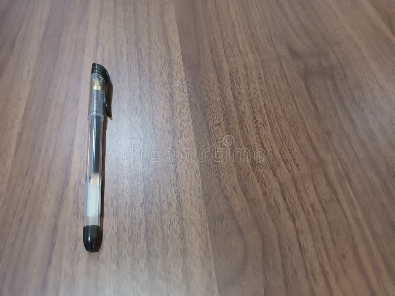 Pen lying on the table stock image. Image of flooring - 250202799