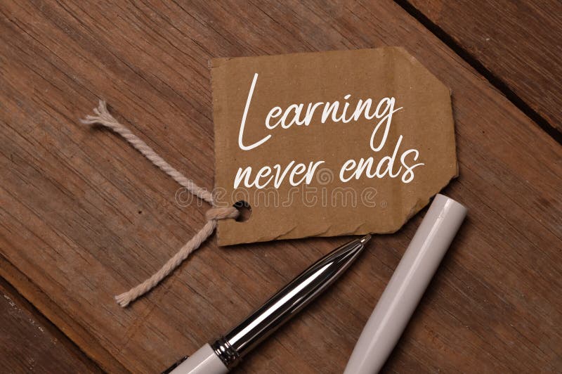 Pen and Memo Note Written with Text LEARNING NEVER ENDS Stock Photo ...