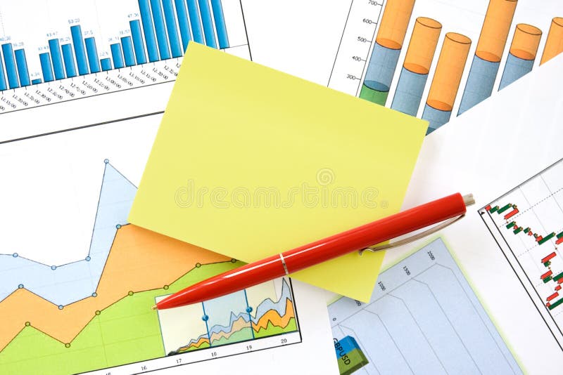 Pen and memo over charts stock photo. Image of finance - 21448352