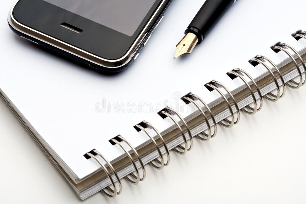 Pen, Notebook and Cell Phone Stock Image - Image of spiral, white: 13196229