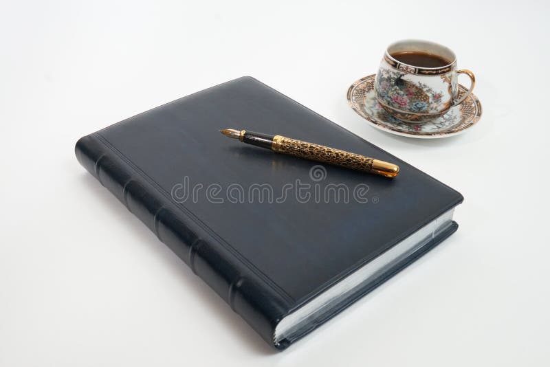 Pen on notebook and cup stock photo. Image of note, lined - 12206582