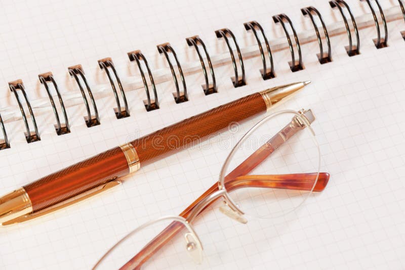 Pen, notebook and glasses stock image. Image of diary - 51715383