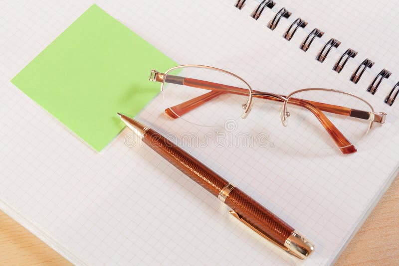 Pen, notebook and glasses stock image. Image of planner - 53984245