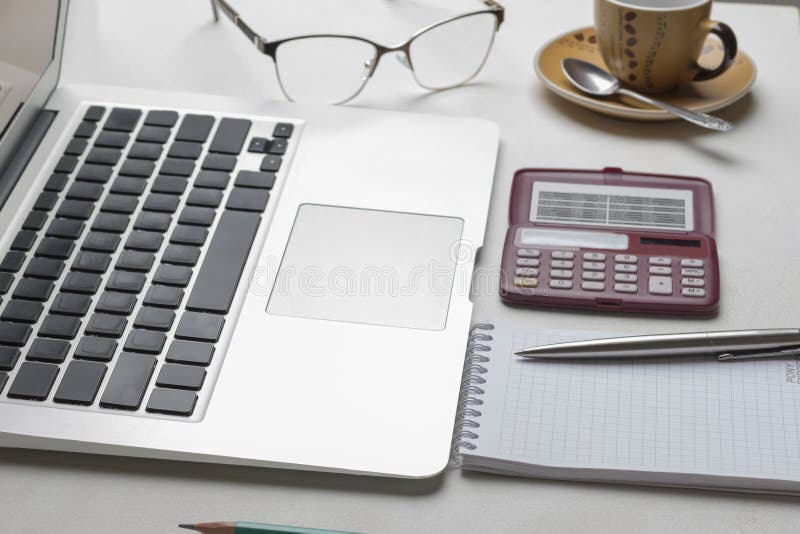 Pen on Notebook, Laptop and Calculator, Glasses, Cup of Coffee Stock ...