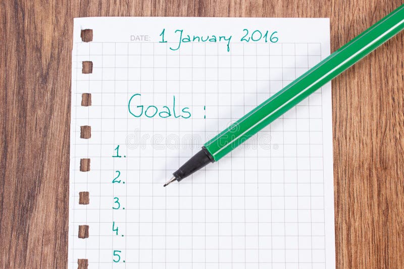 Pen and Notebook for Planning New Years Resolutions and Goals Stock ...